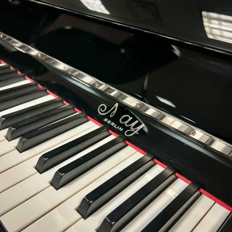 Used May Berlin Upright Piano in Ebony Polish - Merriam Music